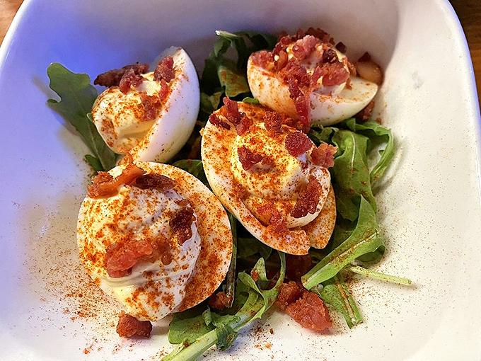 Deviled eggs get the royal treatment with bacon crumbles and a dusting of paprika. Grandma's picnic classic just got a delicious promotion to restaurant royalty.