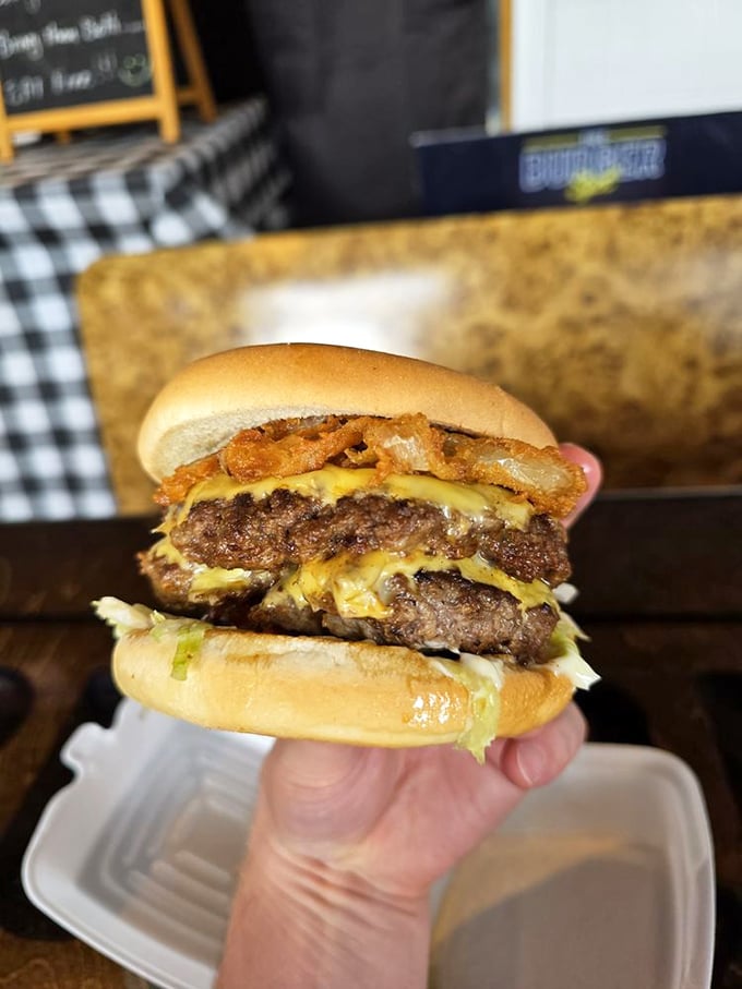 Behold the Double Cheeseburger in all its towering glory—a monument to excess that somehow makes perfect sense after the first magnificent bite.