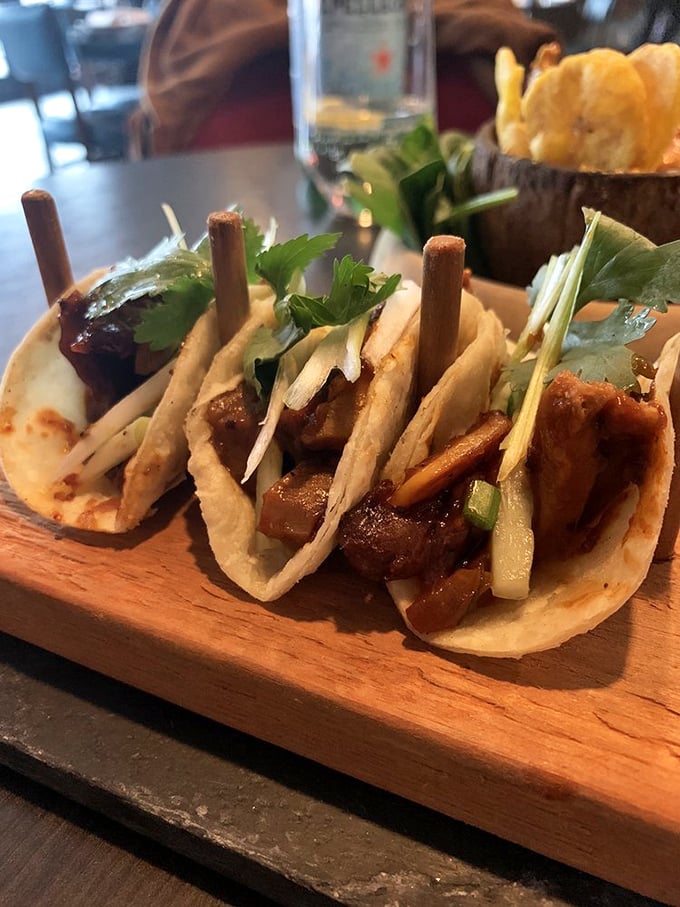 These Duck Paratha Tacos represent culinary diplomacy at its finest—India and Mexico signing a delicious peace treaty on a wooden board in New Jersey.