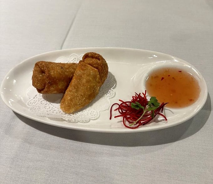 These aren't your average egg rolls—they're the overachievers of the appetizer world, perfectly crisp with that sweet chili sauce singing backup.
