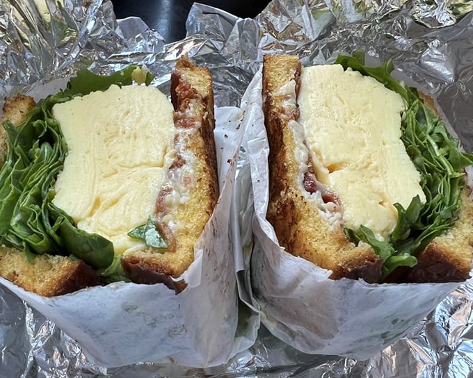 The egg sandwich that launched a thousand return visits. Fluffy eggs and melty cheese between toasted bread—proof that perfection doesn't require complexity.