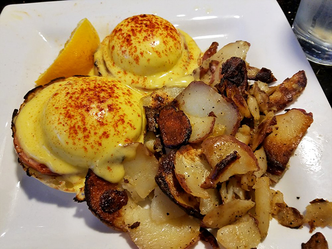 Eggs Benedict that would make the Pope jealous. That hollandaise sauce looks like liquid sunshine with a sprinkle of paprika magic.