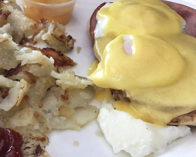 Eggs Benedict that puts the "mmm" in morning—hollandaise sauce cascading like a yellow waterfall of buttery goodness.
