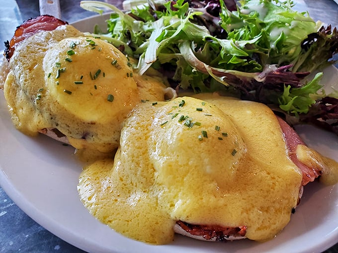 Eggs Benedict done right—poached to perfection and draped in hollandaise that would make a French chef weep.