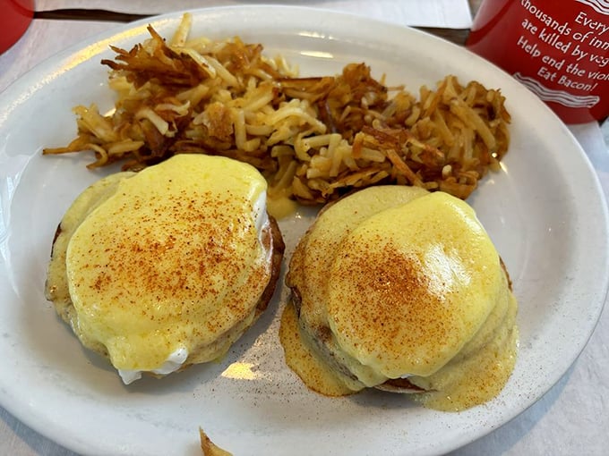 Eggs Benedict done right is poetry on a plate. The hollandaise sauce here doesn't just cover—it embraces, like a warm Maryland morning.