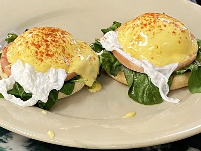 Eggs Benedict that would make Mr. Benedict himself weep with joy – poached to perfection and draped in hollandaise that's sunshine on a plate.