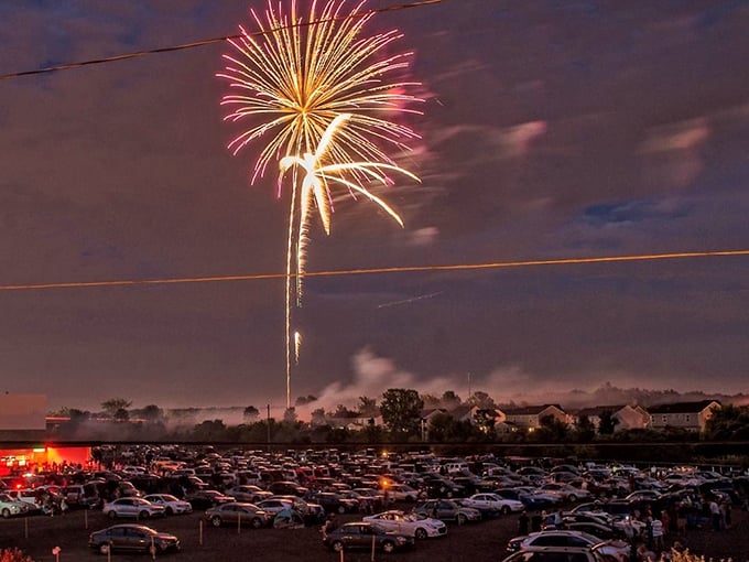 Nothing says "American summer" quite like fireworks bursting over a field of cars, where families create memories that outshine even the brightest explosions.