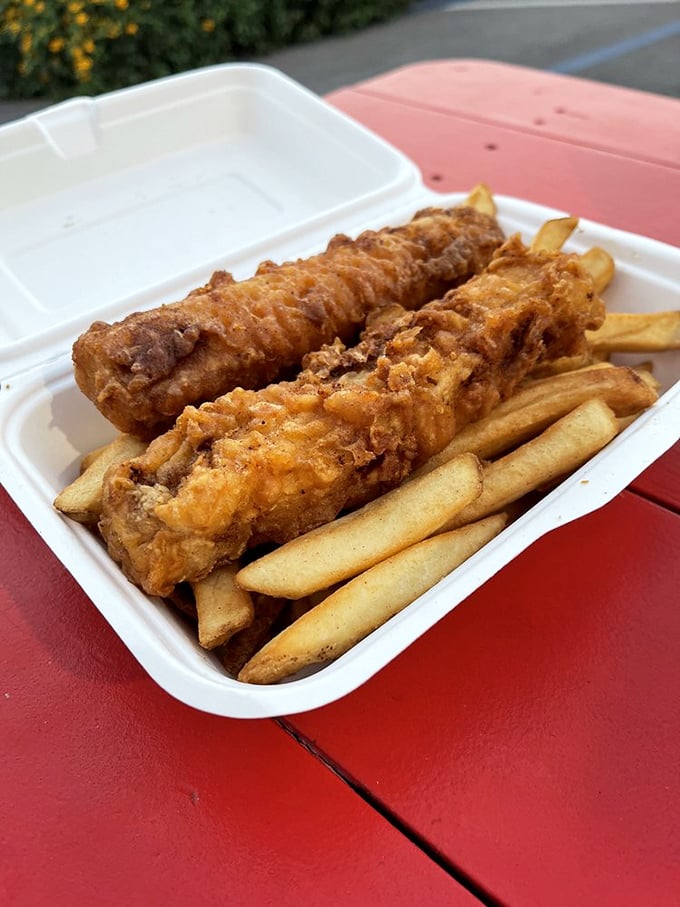 Golden-battered fish alongside perfectly crisp fries—the classic beach meal elevated to an art form. Comfort food with an ocean view.
