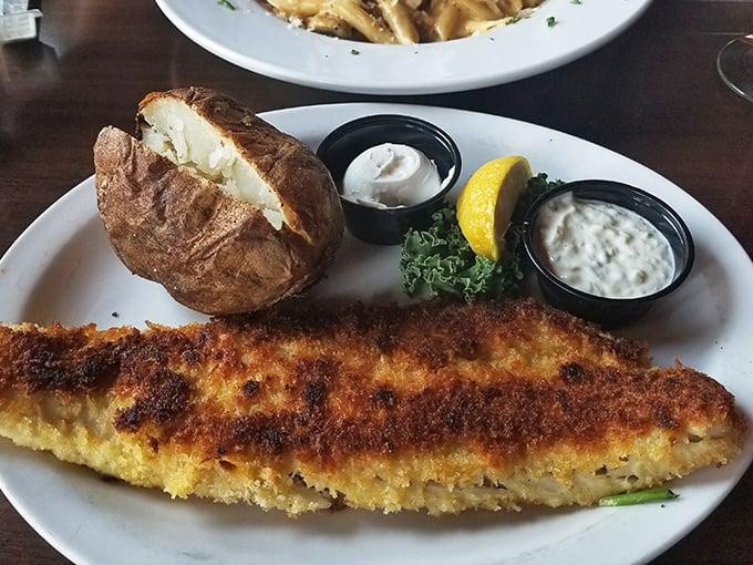 Another walleye masterpiece with a baked potato sidekick—proof that sometimes the classics become classics because nobody's found a better way.