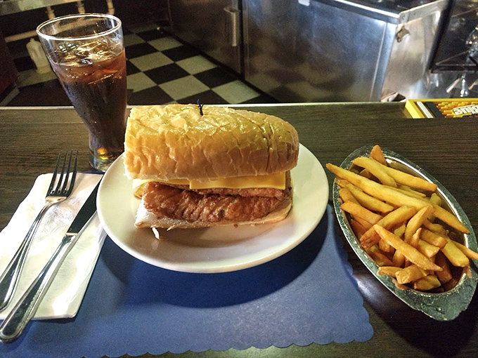 When your fish sandwich needs its own architectural support system, you know you've discovered something truly special here.