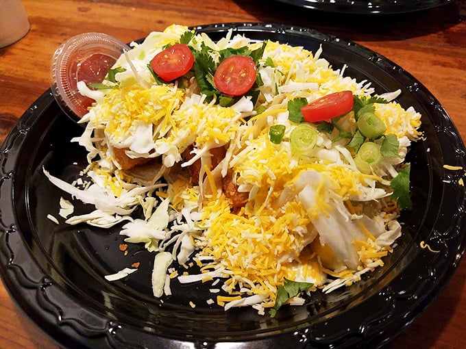 This isn't just a taco—it's a seafood celebration wrapped in a tortilla. Fresh, vibrant, and topped with enough cheese to make Wisconsin proud.