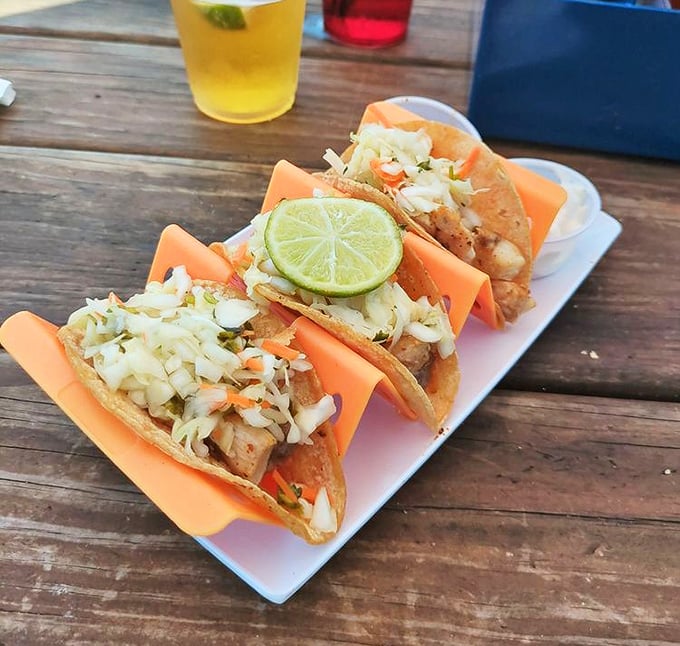 These fish tacos bring beach vacation vibes to your table – crispy, fresh, and topped with enough slaw to make you forget you're not actually in Baja.