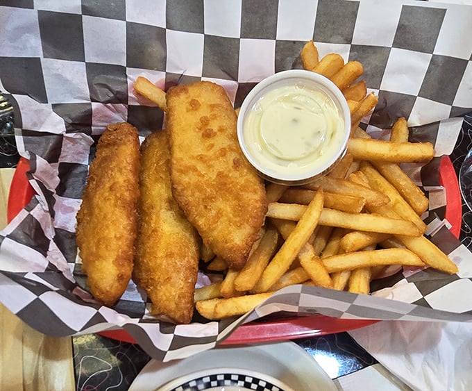 Golden-battered fish that shatters with each bite, paired with fries that strike the perfect balance between crispy and tender.