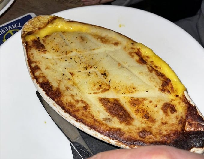 The Fisherman's Pie doesn't just break the surface—it dives deep into comfort food territory with a golden crust that whispers, "Resistance is futile."