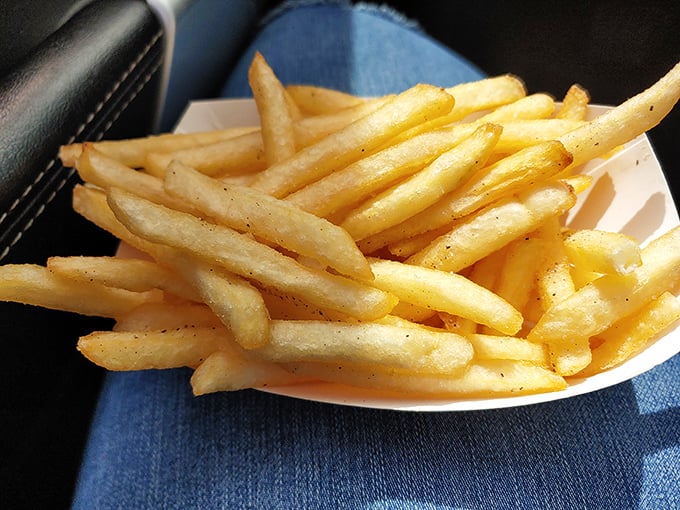 French fries that achieve the golden ratio of crispy exterior to fluffy interior. The kind worth fighting over when someone says "I'll just have a few of yours." 