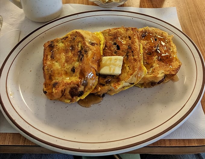 French toast that's crossed the line from breakfast to dessert and isn't apologizing for it. That caramelized exterior is hiding custardy secrets within.