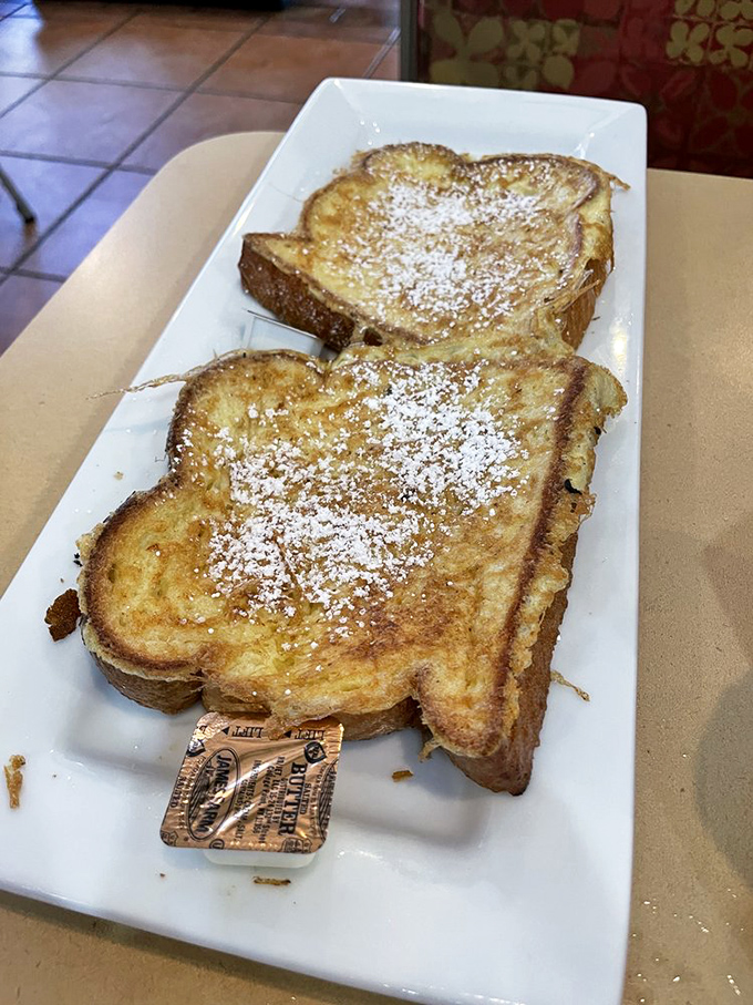 French toast gets the royal treatment here, dusted with powdered sugar like Florida snow.