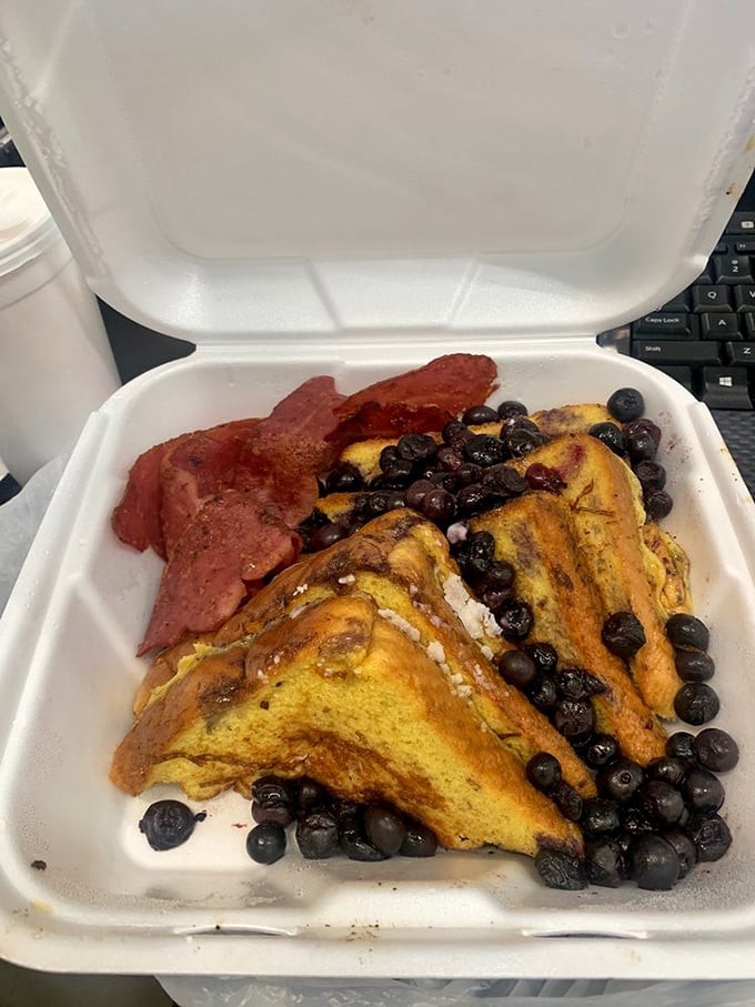 French toast and blueberries—proof that bread can have a glorious second act when bathed in egg and kissed by heat.