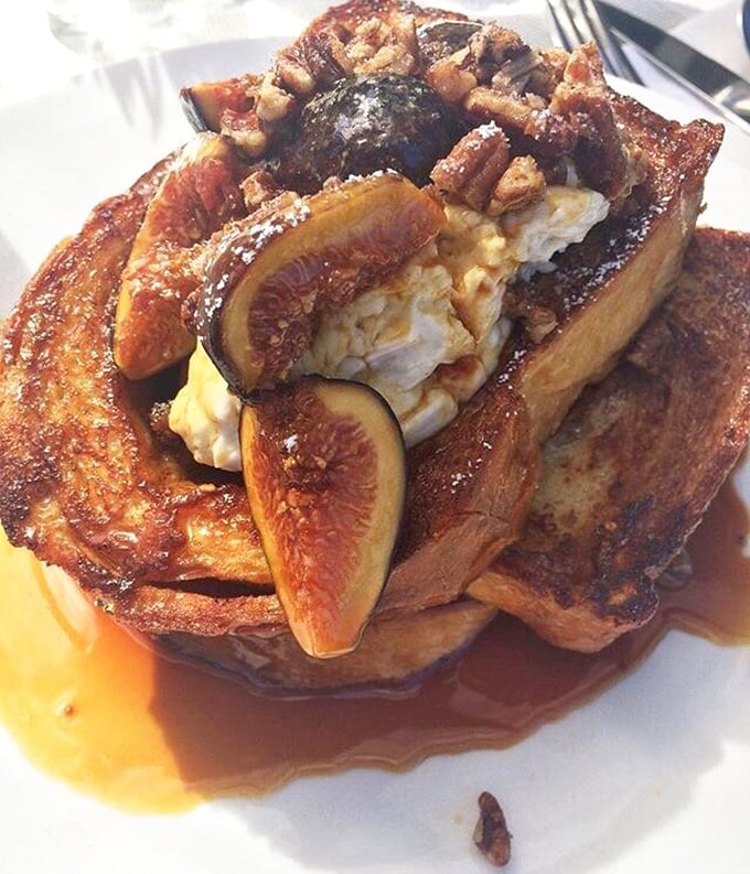 French toast that looks like it graduated from culinary school with honors. Those fresh figs aren't just garnish—they're co-stars in this breakfast drama.
