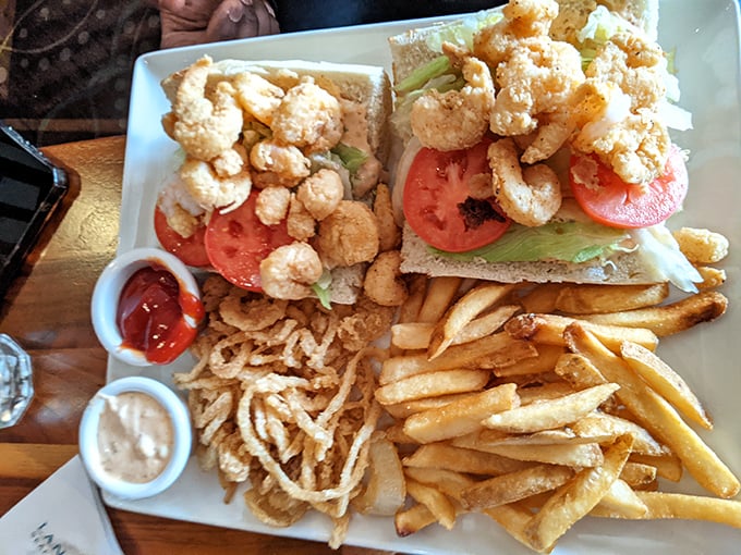 The Po' Boy's rich cousin—this fried seafood sandwich brings together golden-crisp shrimp, crispy fries, and the promise of a delicious food coma.
