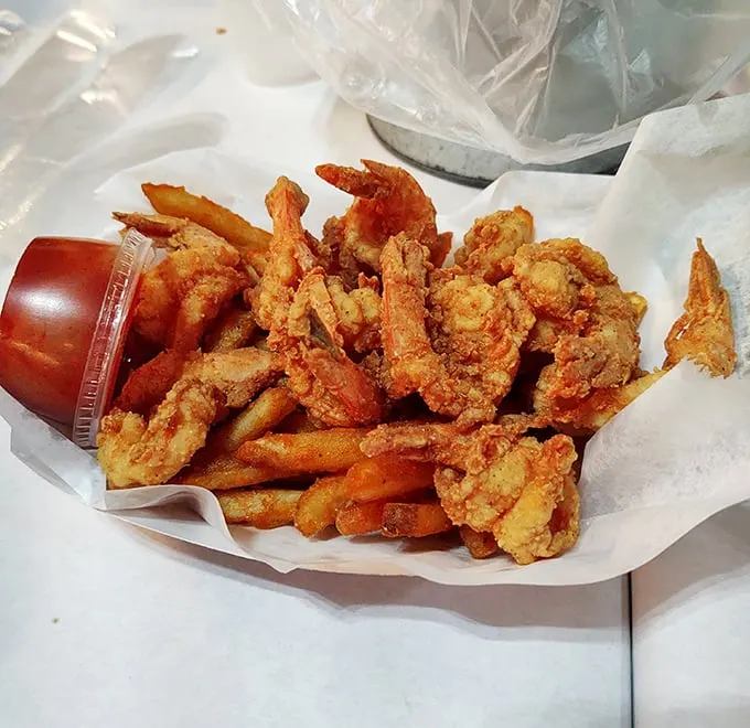 These fried shrimp aren't just golden brown – they're the color of childhood memories and perfect summer days at the beach.