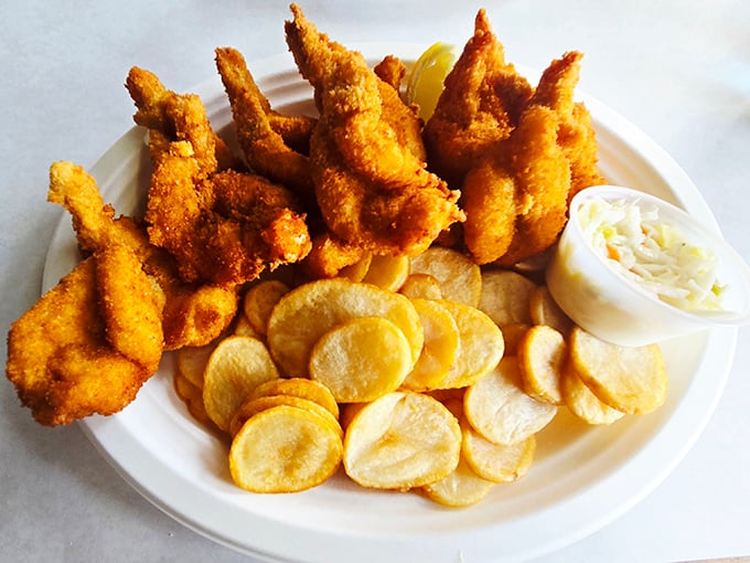 These golden-fried shrimp stand at attention like delicious little soldiers, ready to march straight into a pool of cocktail sauce.