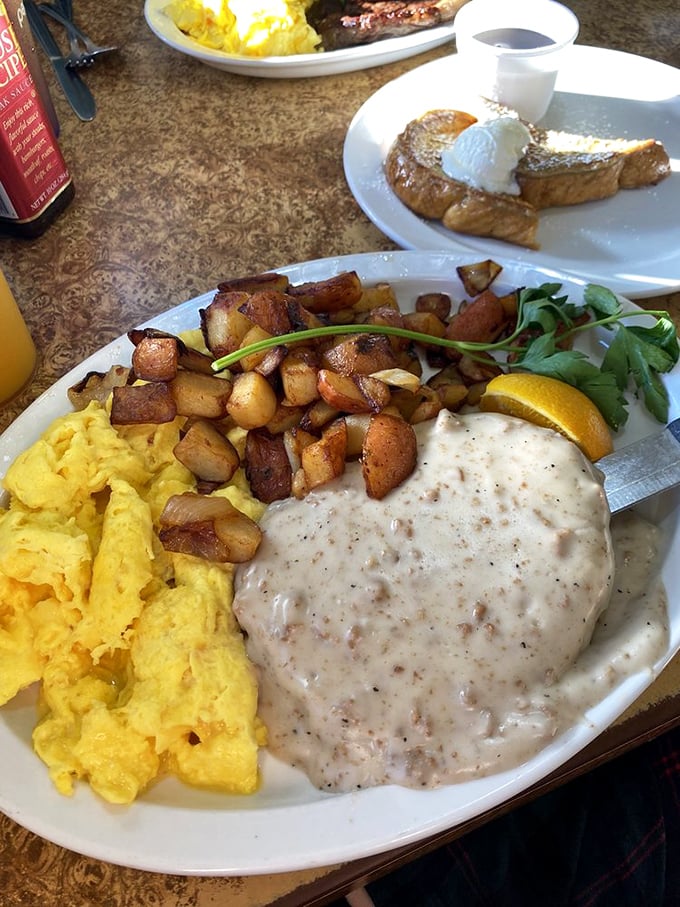 Country fried steak with gravy and eggs – the kind of breakfast that makes you want to cancel your lunch plans. And possibly dinner too.