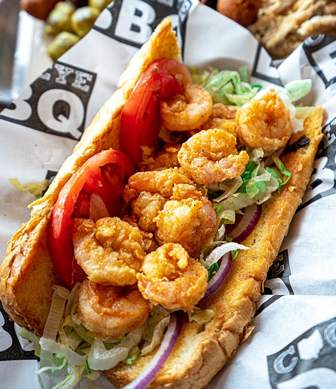 The Po-Boy that makes you rich with flavor. These golden-fried shrimp are the jewelry of the sandwich world—flashy yet substantive.