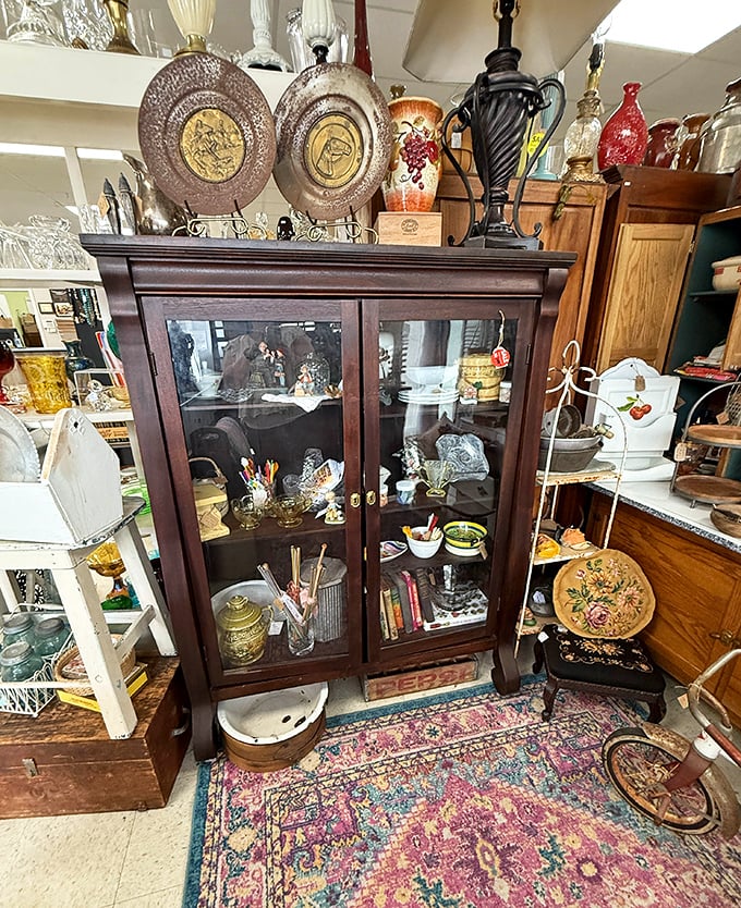 This isn't just furniture—it's functional time travel. That cabinet probably remembers more family secrets than your great-aunt Mildred.
