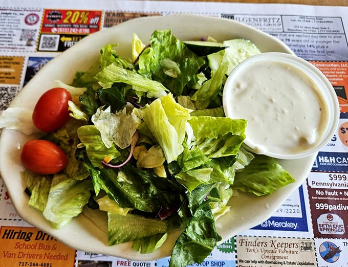 Even the garden salad gets the respect it deserves—crisp, fresh, and ready to convince you that vegetables can be more than an obligation.
