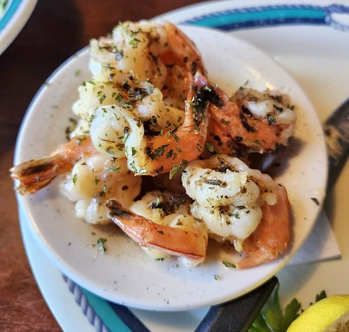 Garlic shrimp that's not playing around – plump, perfectly cooked, and unapologetically aromatic. Your breath might suffer, but your taste buds will throw a parade.
