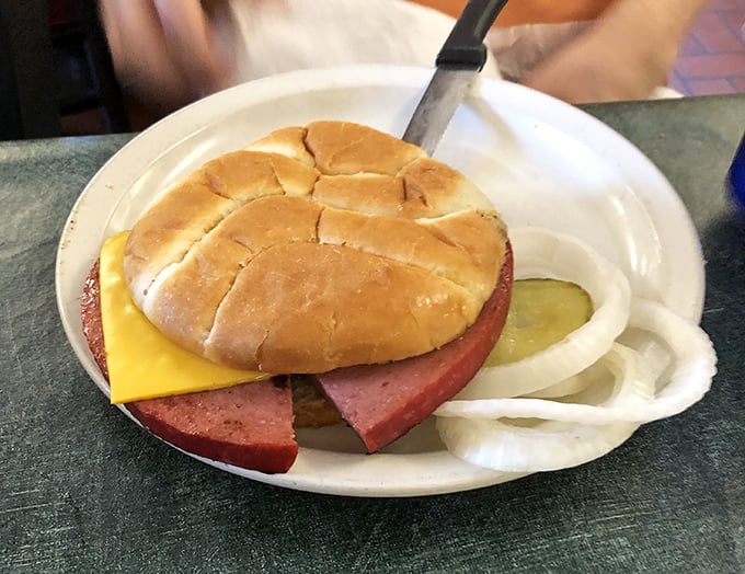 The German bologna sandwich—thick-cut, grilled to perfection, and adorned with cheese—proves that sometimes the simplest pleasures deliver the most satisfaction.