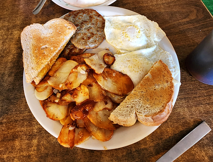 This breakfast plate doesn't need filters or fancy lighting—just your undivided attention and an empty stomach. Those home fries are calling your name.