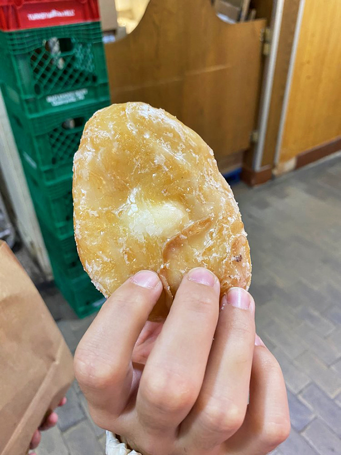 The glazed cream donut – proof that sometimes the simplest pleasures are the most profound. That glisten isn't just sugar; it's joy.