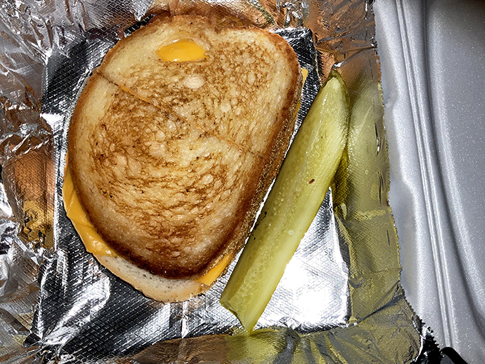 Golden-brown perfection meets gooey cheese in this simple yet transcendent grilled sandwich – comfort food that speaks a universal language.
