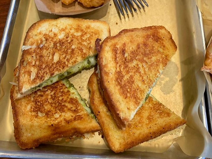 Golden, gooey perfection proves that sometimes the simplest pleasures – bread, cheese, heat – create pure magic.