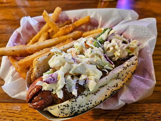 A hot dog dressed in coleslaw is like wearing a tuxedo to a backyard barbecue—unexpectedly perfect and oddly sophisticated.