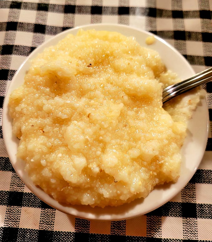 These buttery grits aren't just a side dish – they're a Southern hug in a bowl, creamy enough to make your grandmother nod in silent approval.