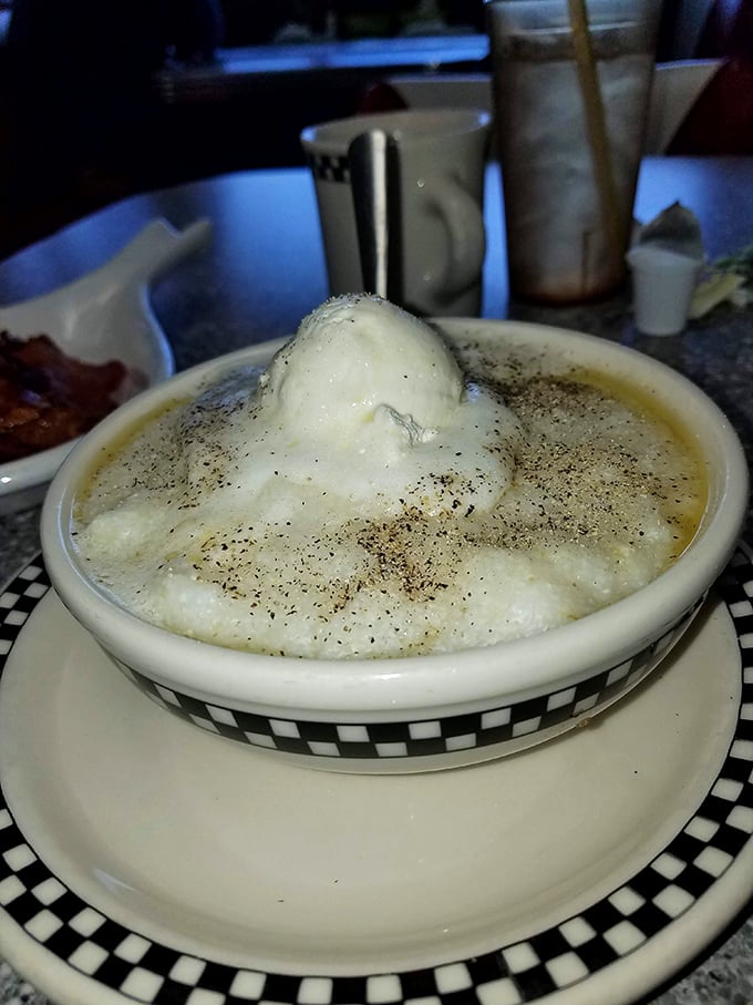 These aren't your grandmother's grits—unless your grandmother was a culinary genius who understood the perfect balance of creamy texture and peppery seasoning.