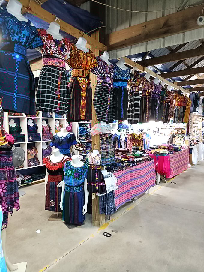 A rainbow explosion of traditional Guatemalan textiles and dresses transforms shopping into cultural exploration. Each garment showcases generations of craftsmanship.
