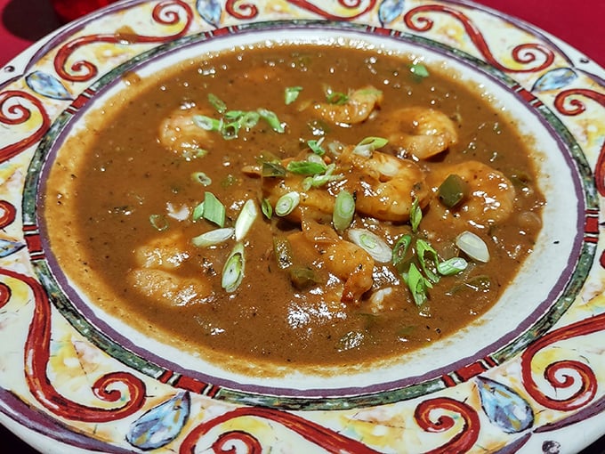 This gumbo isn't just a soup—it's a history lesson in a bowl. Rich roux, tender shrimp, and green onions create a Louisiana symphony in Pennsylvania.