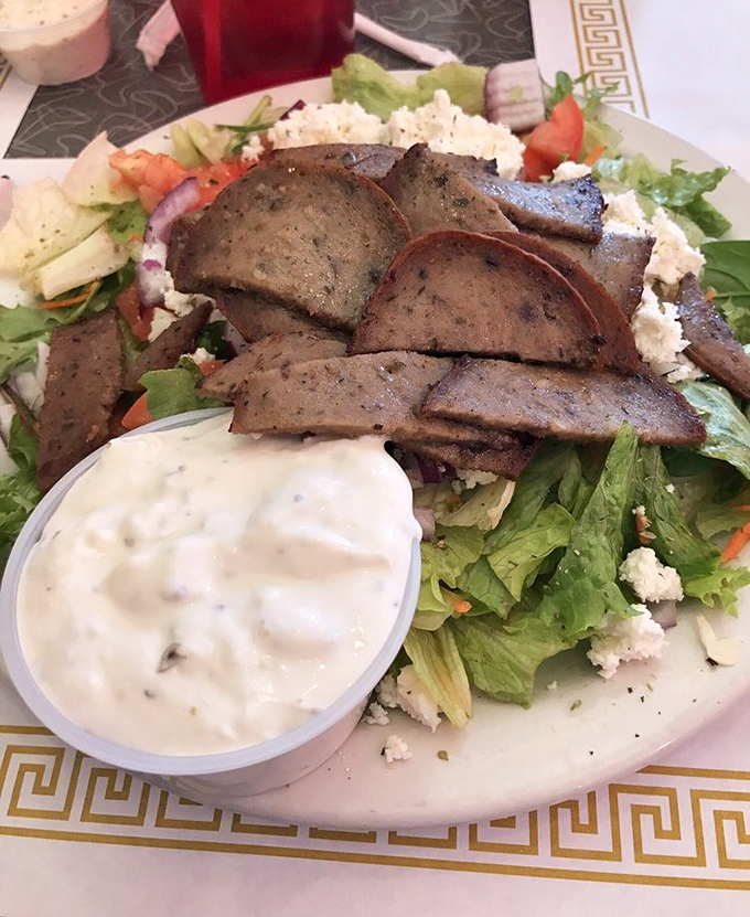 Greek meets Midwest in this gyro salad—a cultural handshake where Mediterranean flavors find their perfect Ohio home alongside creamy dressing.