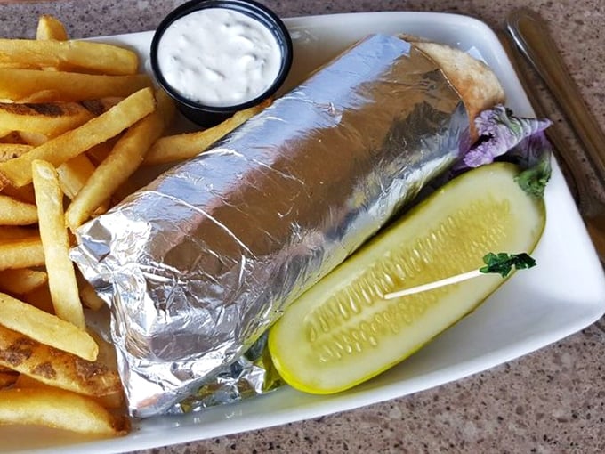 Wrapped in foil like a precious gift, this gyro promises Mediterranean flavors that transport you across oceans without leaving Ohio. 