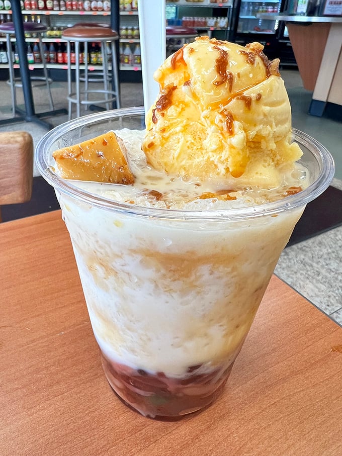 Halo-halo isn't just dessert, it's edible performance art. Layers of sweetened beans, jellies, shaved ice, and ice cream create a carnival in a cup.