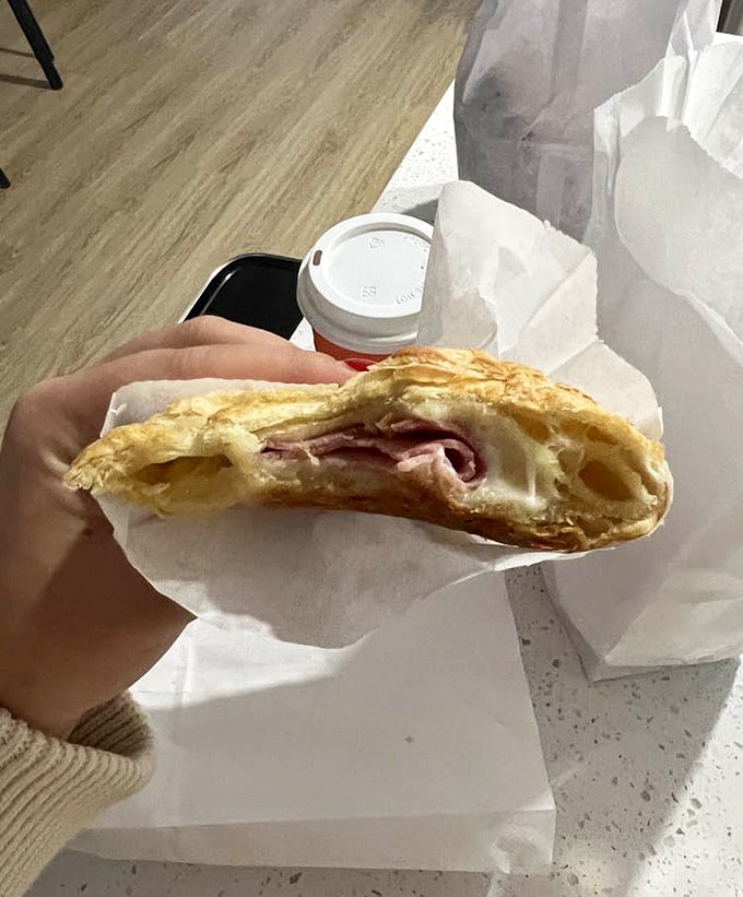 The ham and cheese croissant proves that Randy's isn't just a one-trick pony—it's a full-fledged breakfast institution with layers of buttery potential.