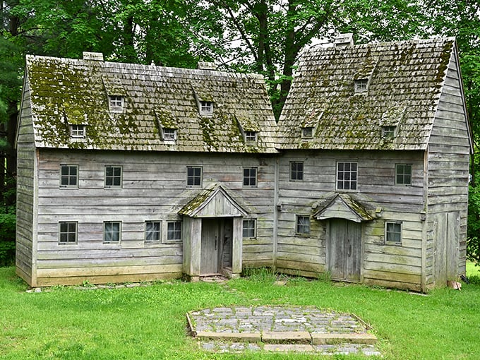 The Ephrata Cloister's weathered wooden buildings whisper tales of simpler times—though I'm grateful modern beds don't require wooden pillows.