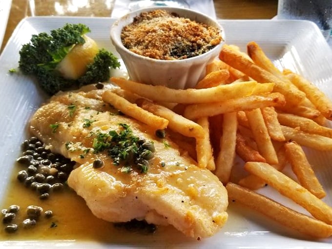 A perfectly cooked fish fillet with golden-brown crust, accompanied by creamy sides that make you forget vegetables were ever boring.