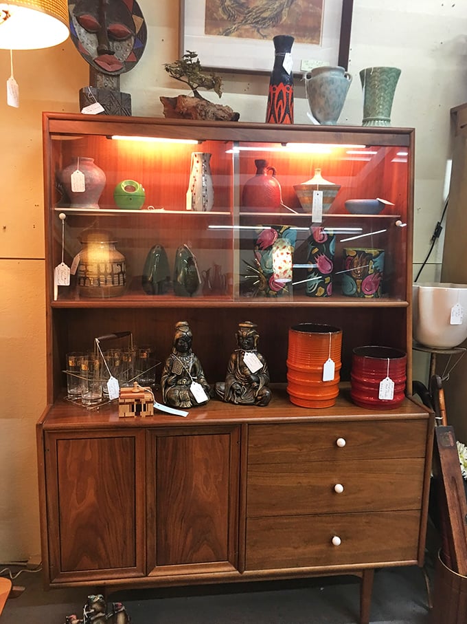 This mid-century hutch isn't just furniture – it's a time machine waiting to transport your dining room back to an era when craftsmanship mattered.