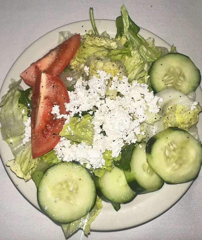 A Greek salad that respects the classics—crisp, fresh, and adorned with feta that tastes like it was shipped directly from Athens this morning.