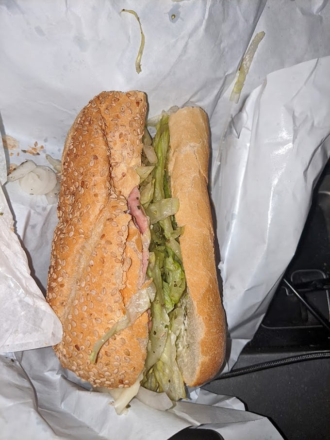 Two worlds collide in this Italian hoagie – the sesame-seeded roll housing layers of deli meats and crisp lettuce. A sandwich that demands respect.